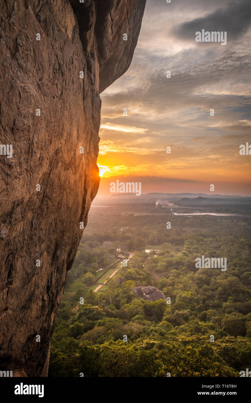 The sun sets over the ancient remains of the fortress on top of ...