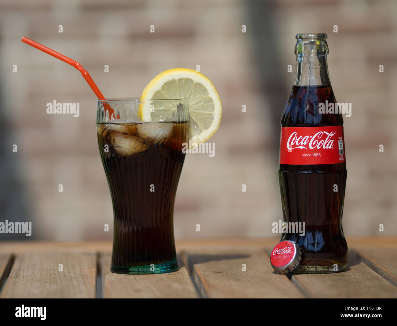 HOEILAART, BELGIUM - MAY 17 2017: A coca cola bottle next to a coke ...