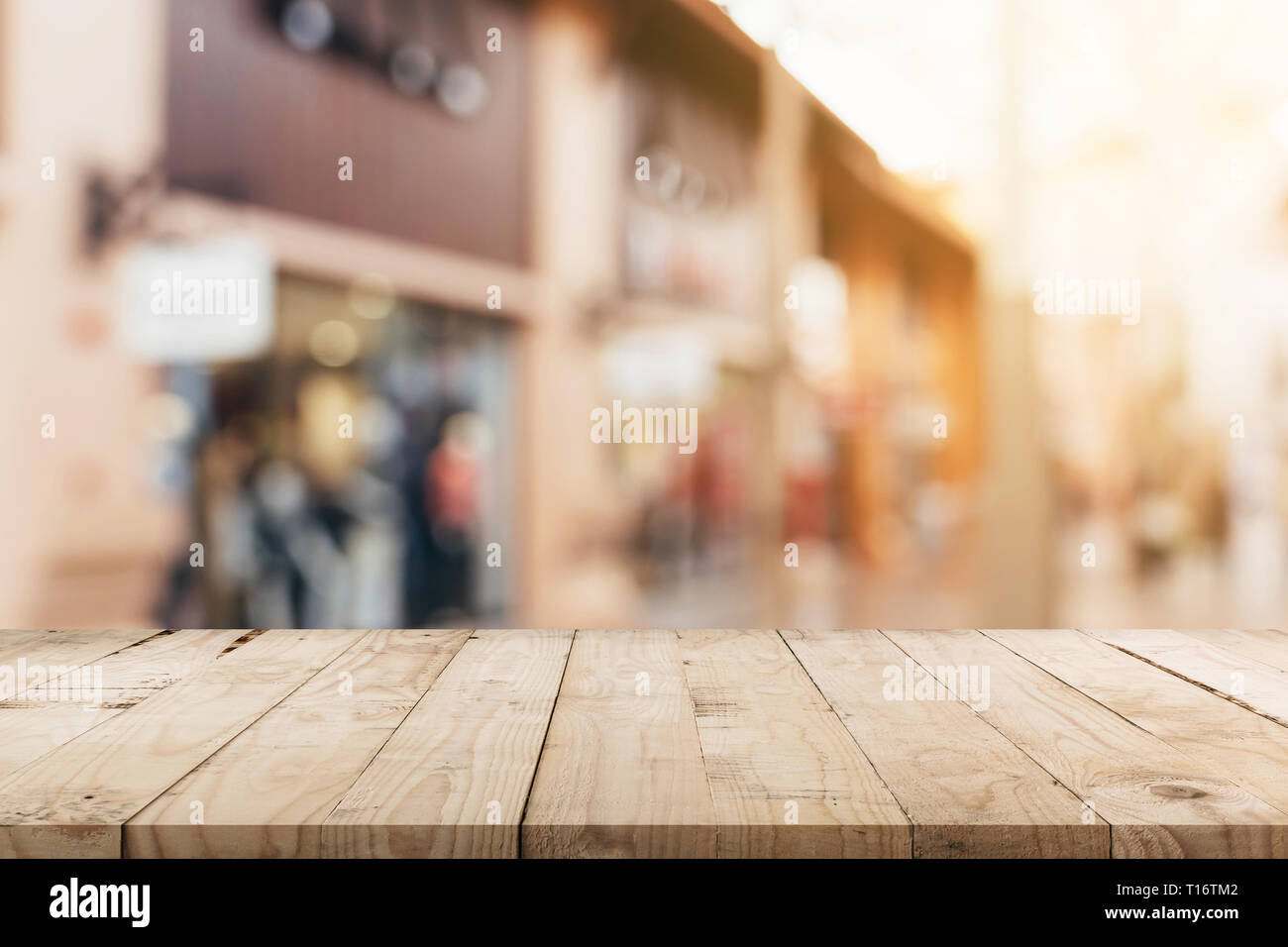 Empty wood table and Vintage tone blurred defocused of crowd people in ...