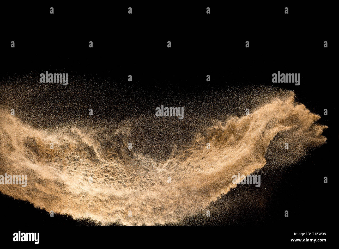 Golden dry river sand explosion isolated on white background. Abstract ...