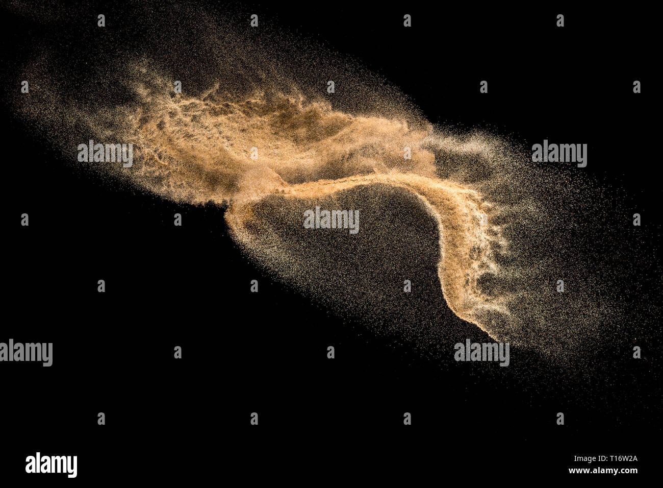 Golden dry river sand explosion isolated on white background. Abstract ...