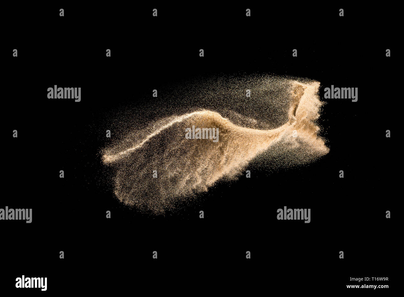 Golden dry river sand explosion isolated on white background. Abstract ...