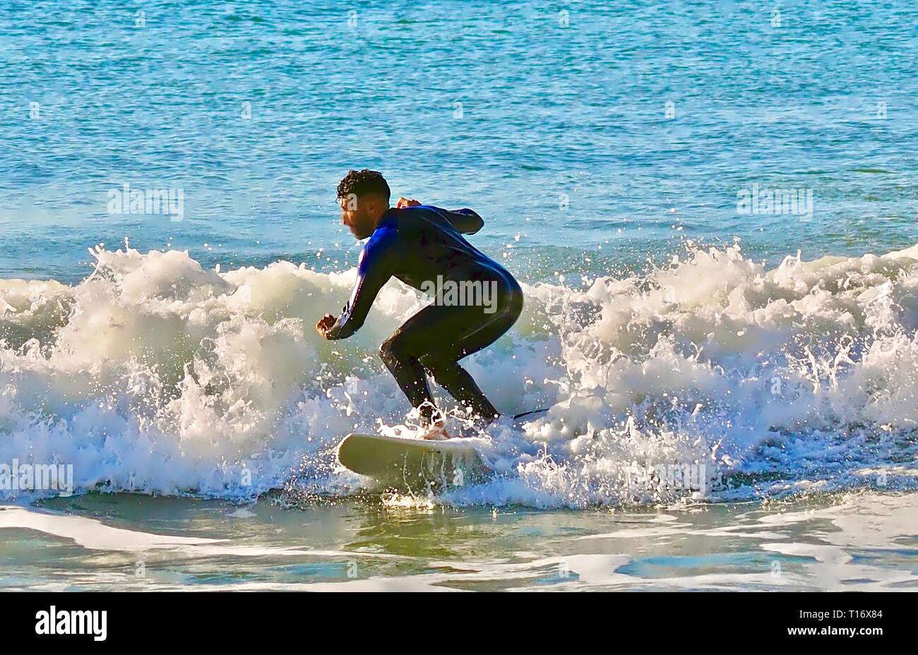Man surfing big waves Stock Photo - Alamy