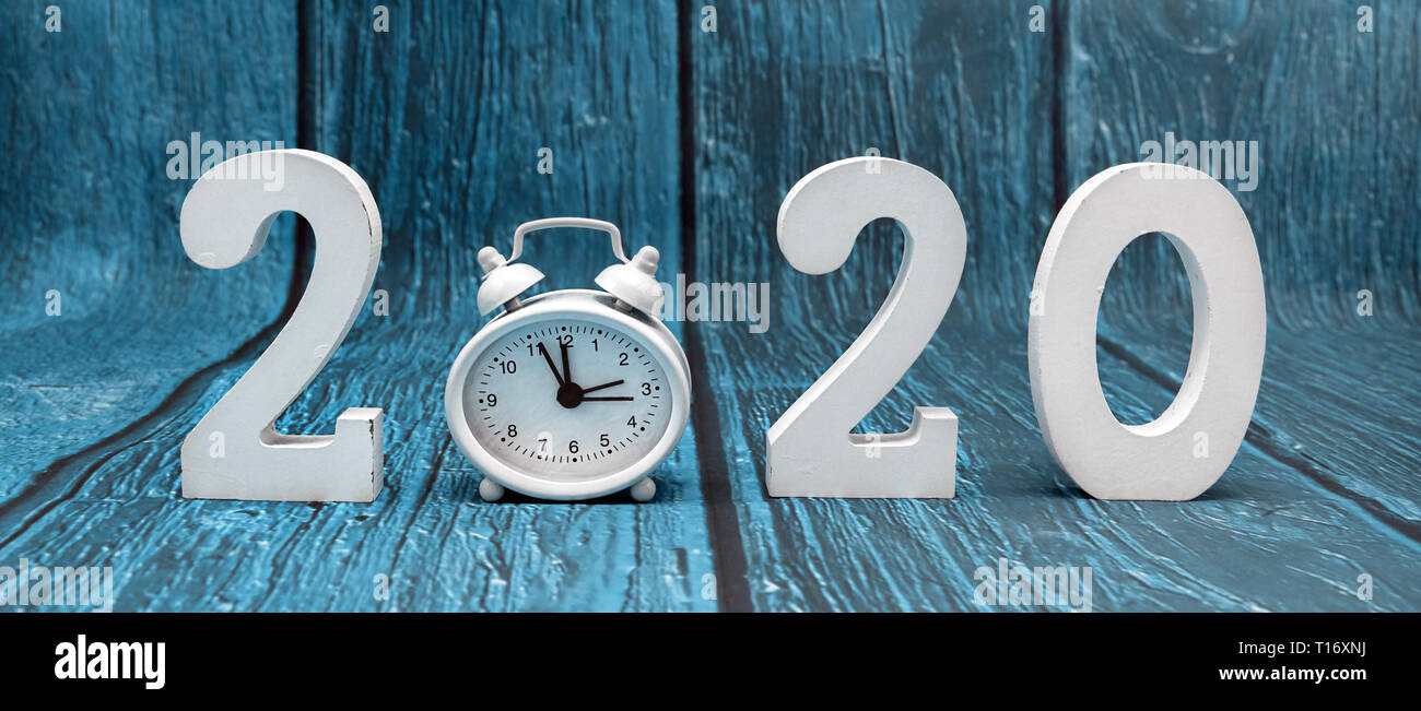 Happy New Year. 2020 numbers on blue background Stock Photo - Alamy