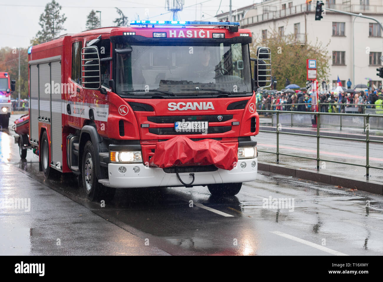 European street, Prague-October 28, 2018: Fire brigade workers are ...