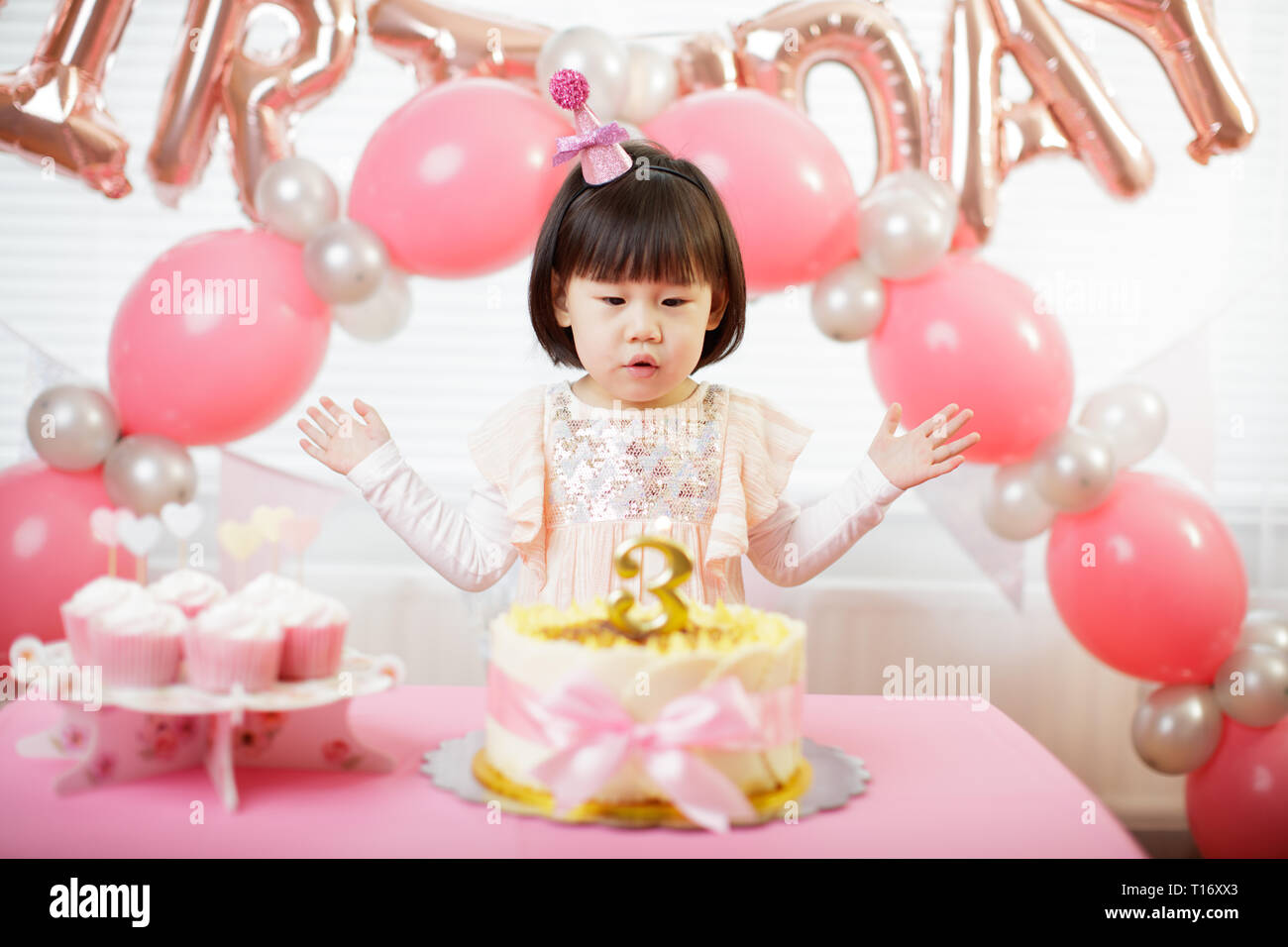toddler girl celebrating her third birthday at home Stock Photo - Alamy