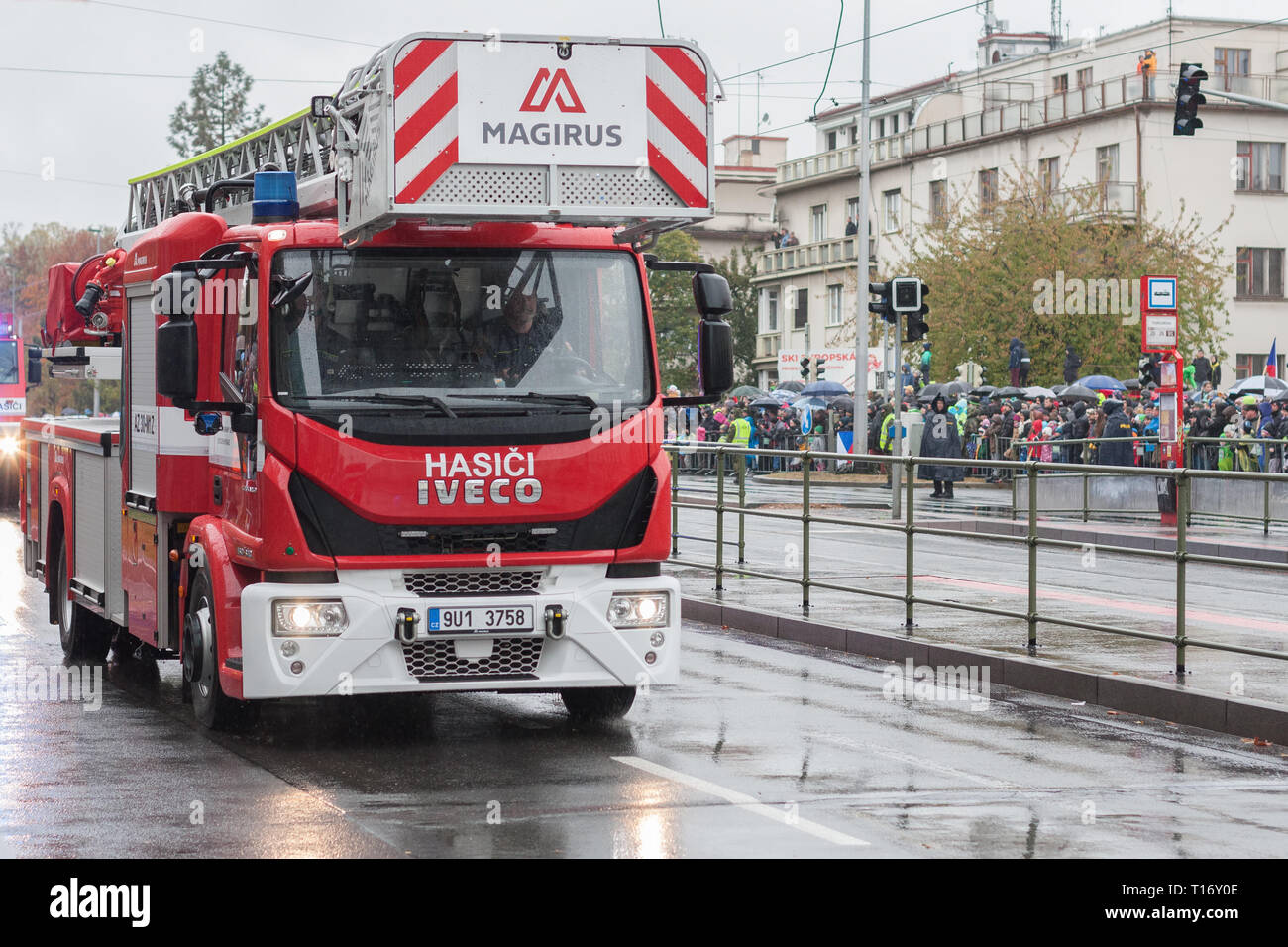 European street, Prague-October 28, 2018: Fire brigade workers are ...