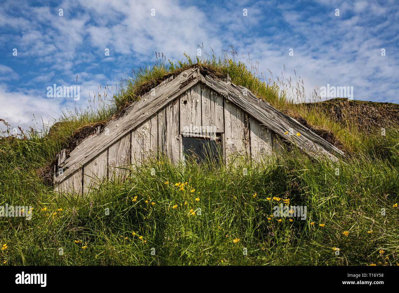 Historic Turf house underground with window, Southern Iceland, Europe ...