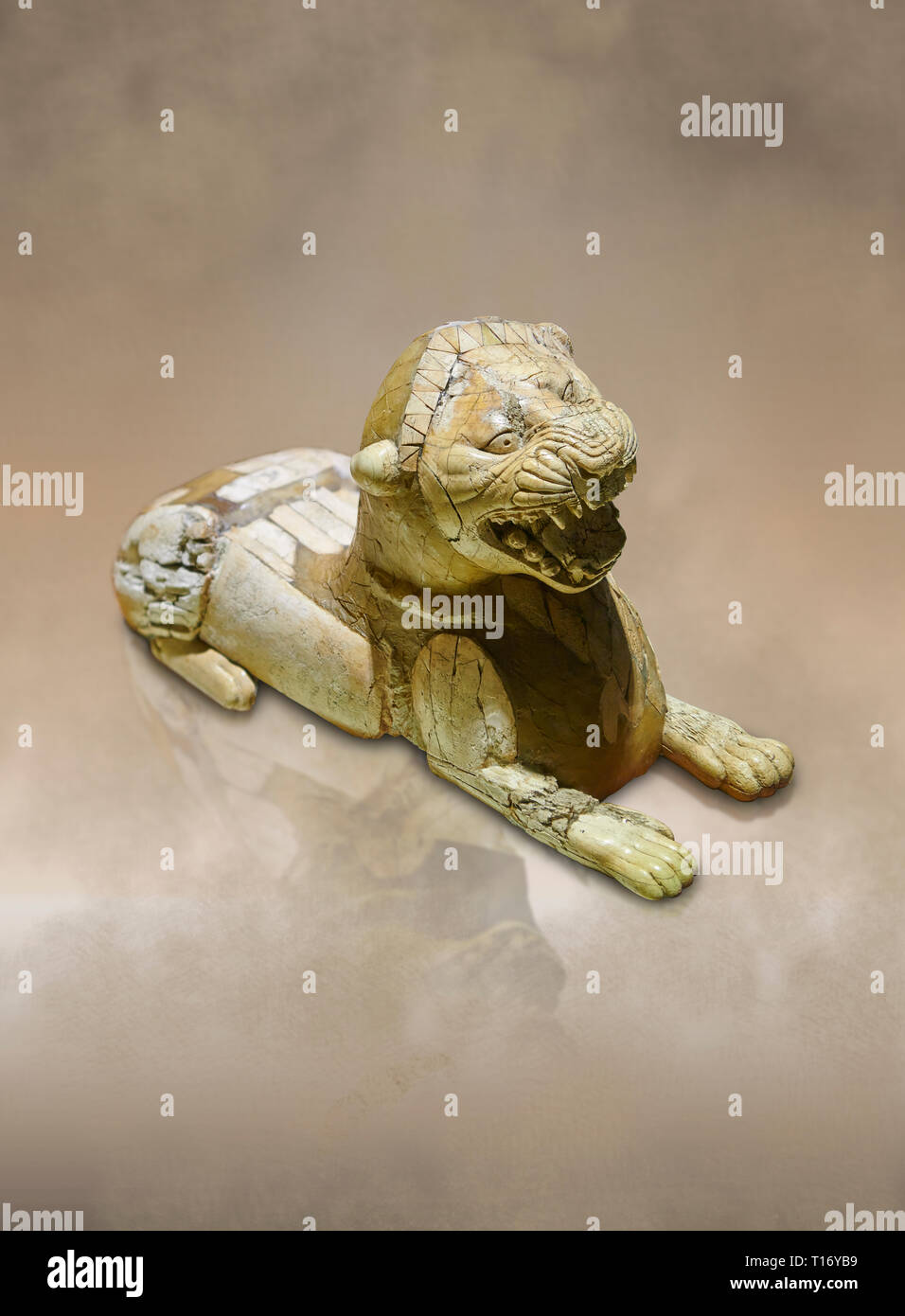 Phrygian ivory statuette carved as a roaring lion lying down from a ...
