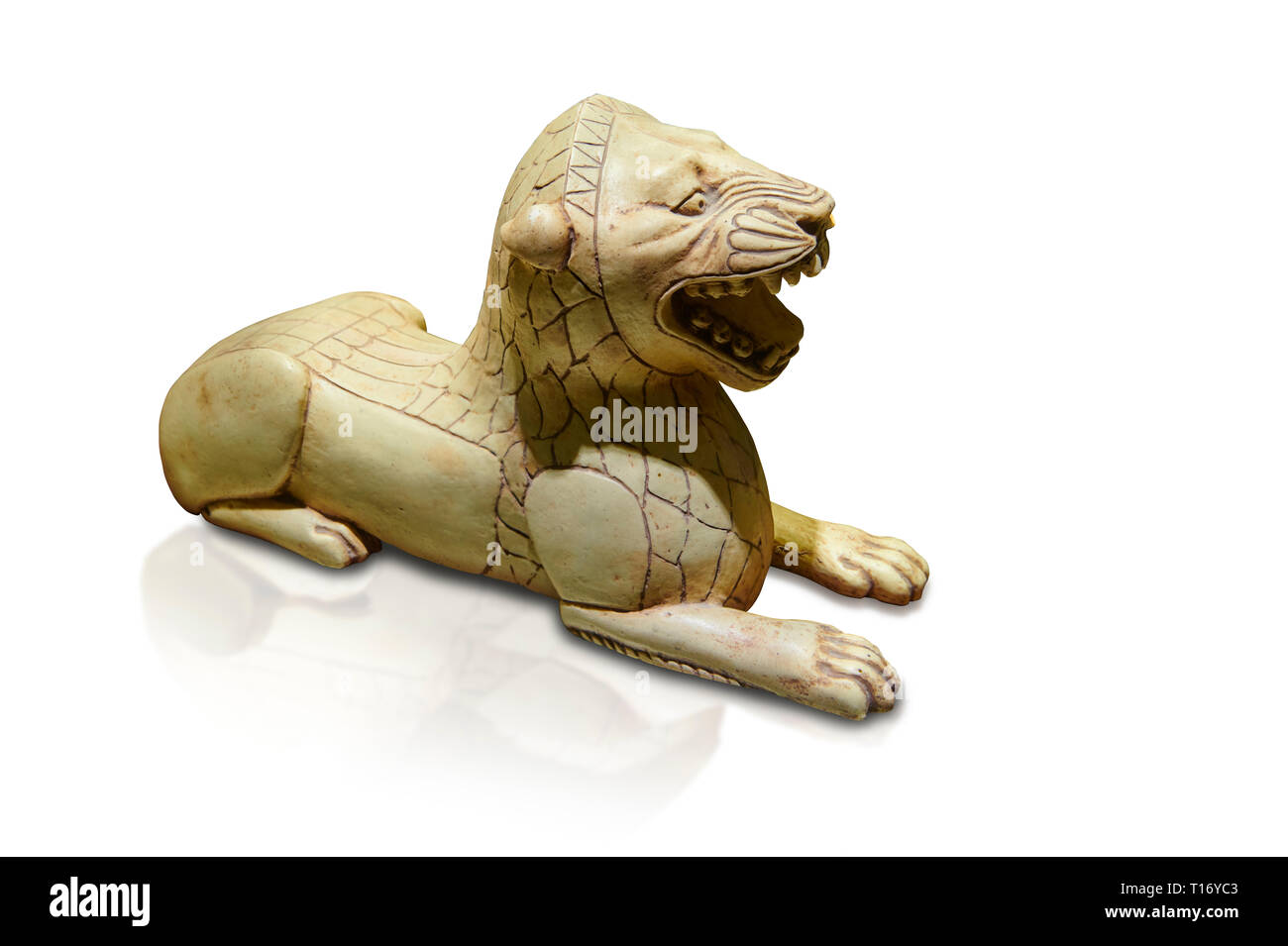 Phrygian ivory statuette carved as a roaring lion lying down from a ...