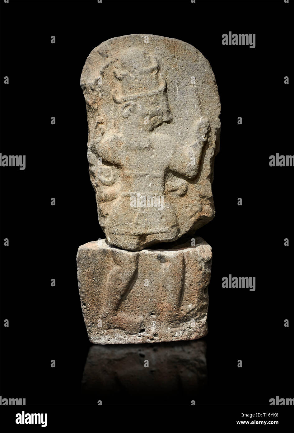 Hittite monumental relief sculpture of a god probably about to kill a ...