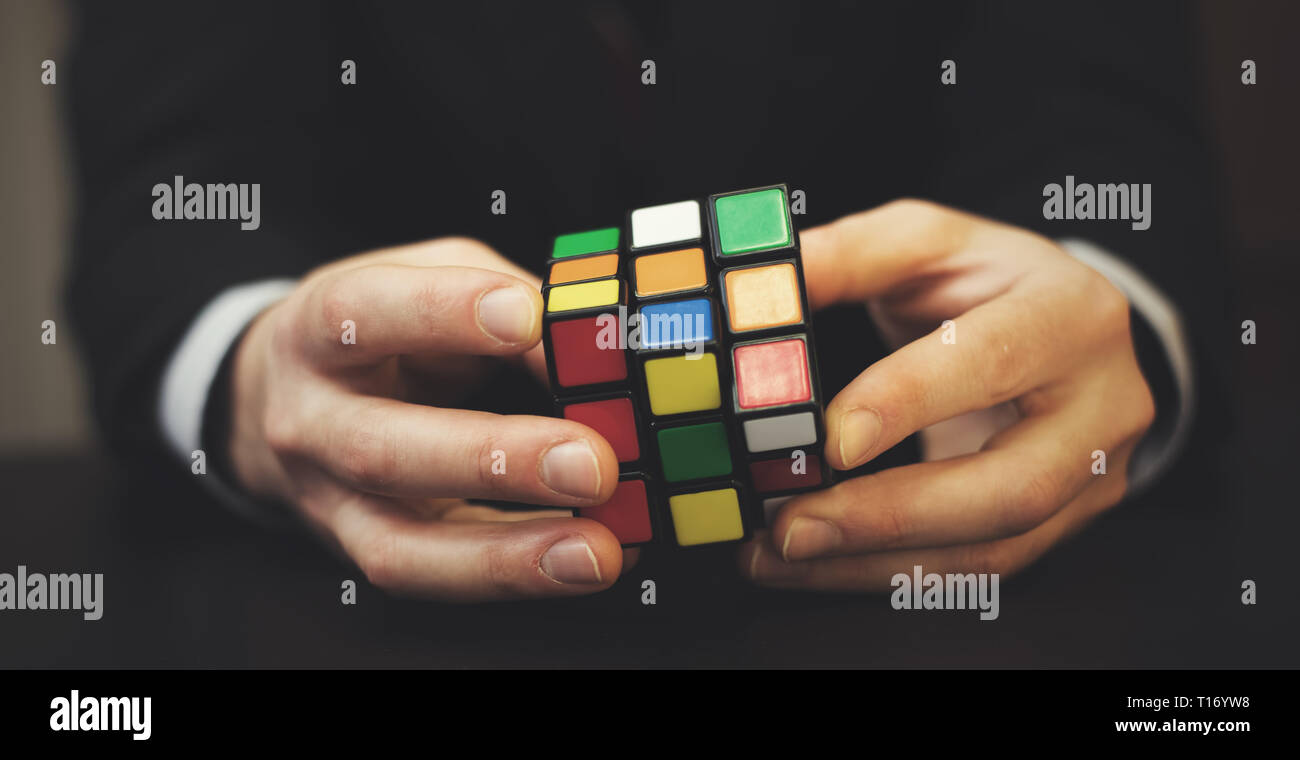 Man with rubik cube hi-res stock photography and images - Alamy