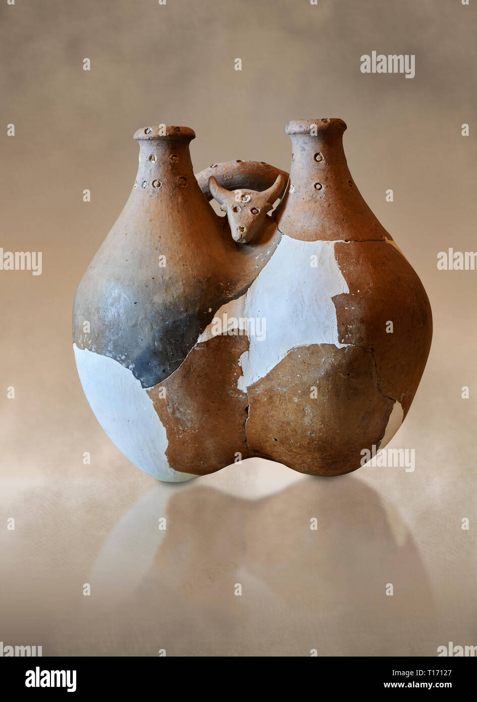 Hittite terra cotta cult vessel decorated with a goat relief. Hittite ...