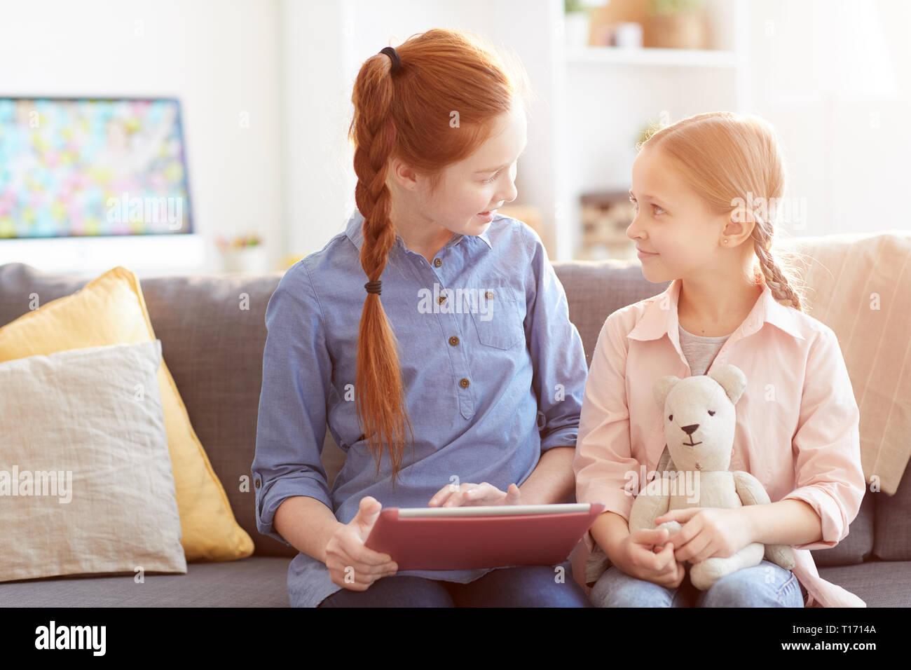 Two Girls Using Internet Stock Photo - Alamy
