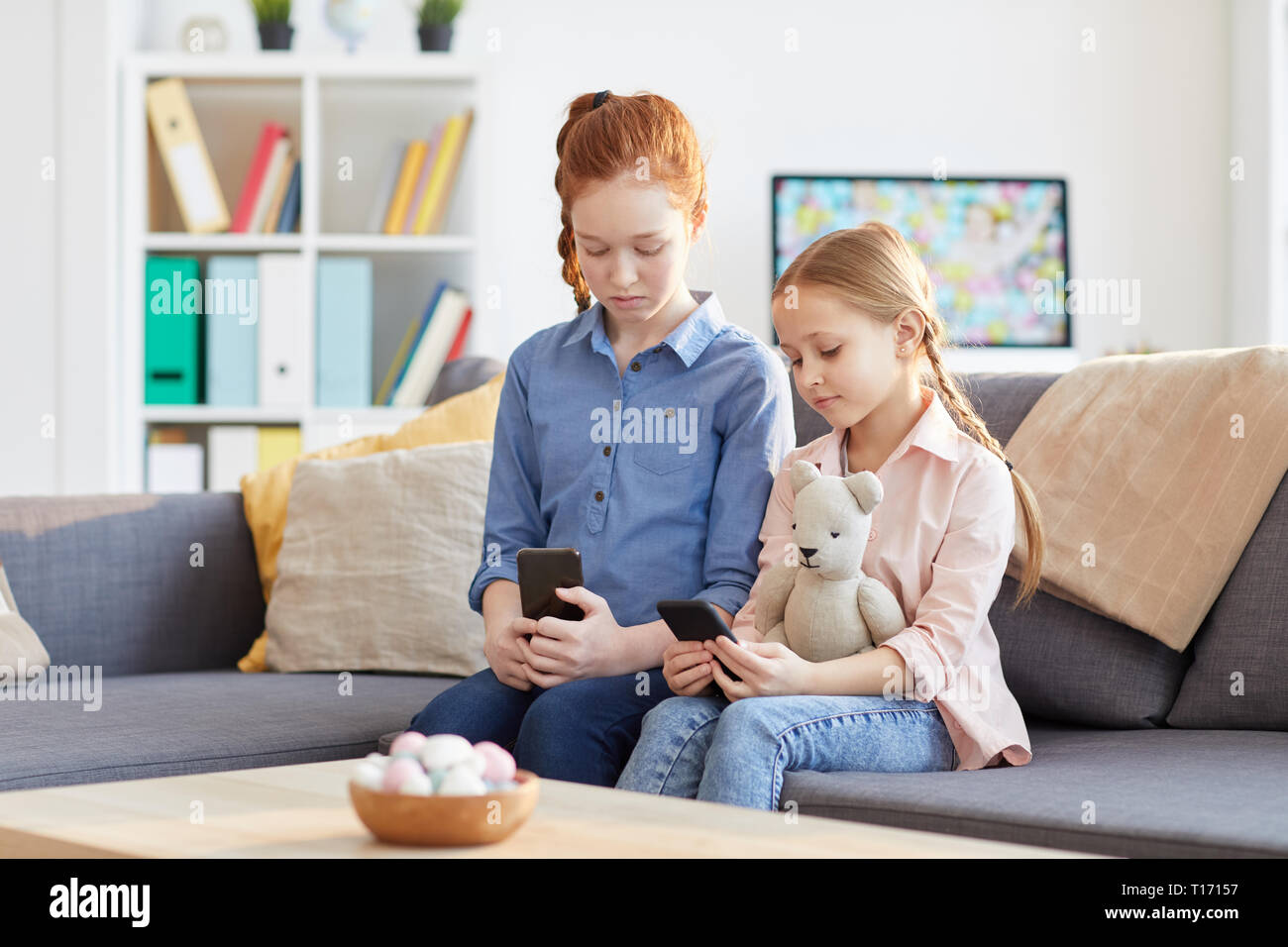 Kids with Smartphone Addiction Stock Photo - Alamy