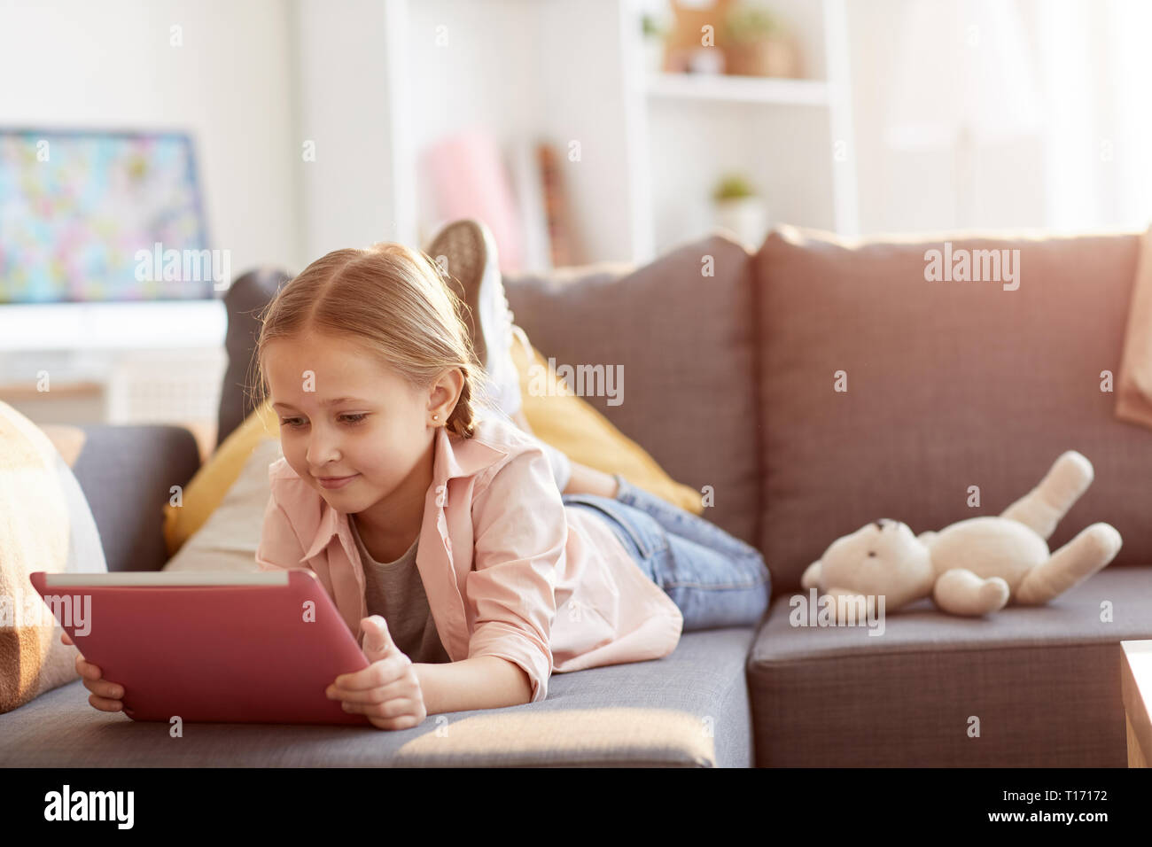 Little Girl using Tablet Stock Photo - Alamy