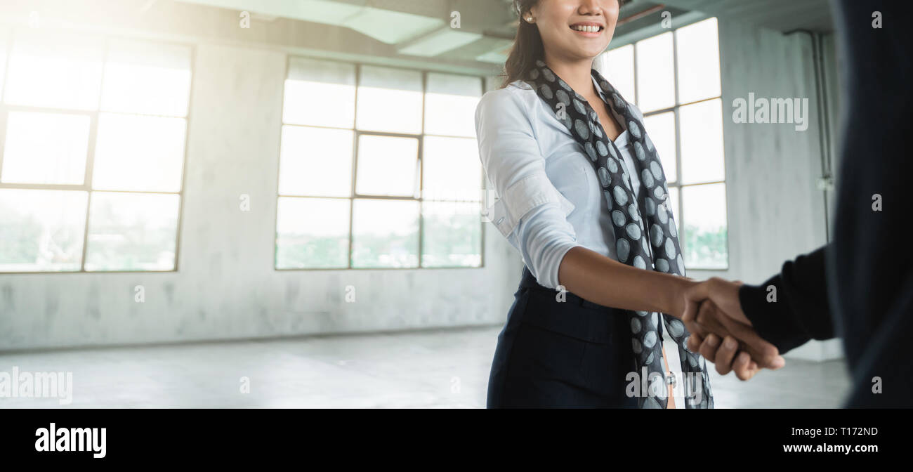 gesture of woman handshake business deal Stock Photo - Alamy