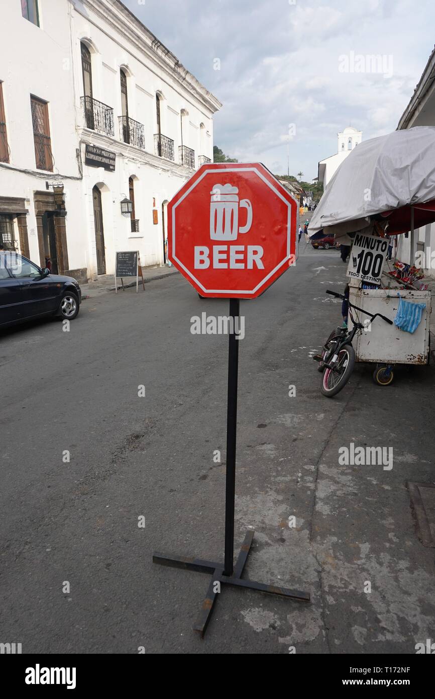 Red Beer Stop Sign outside a Cafe in Calle 5, Popayan, Colombia Stock ...