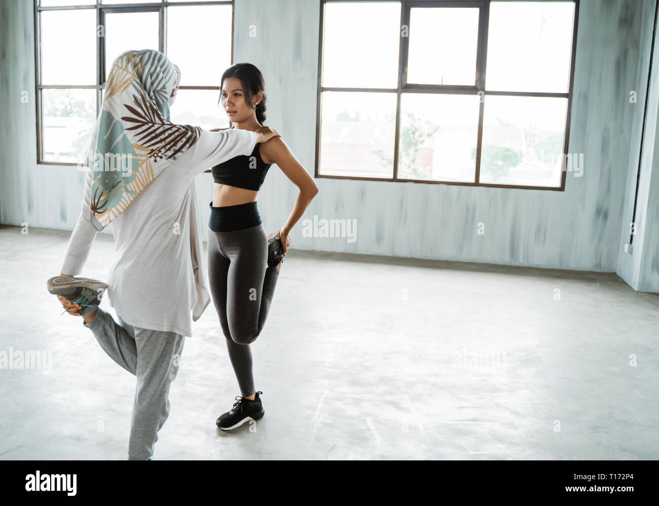 two friends doing movement core exercises Stock Photo - Alamy