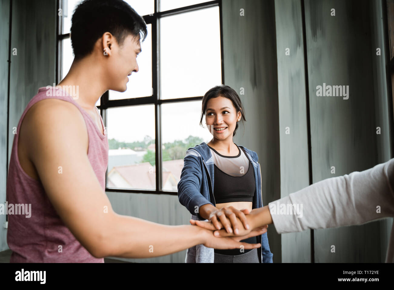 gesture of sport shake hand in the gym Stock Photo - Alamy