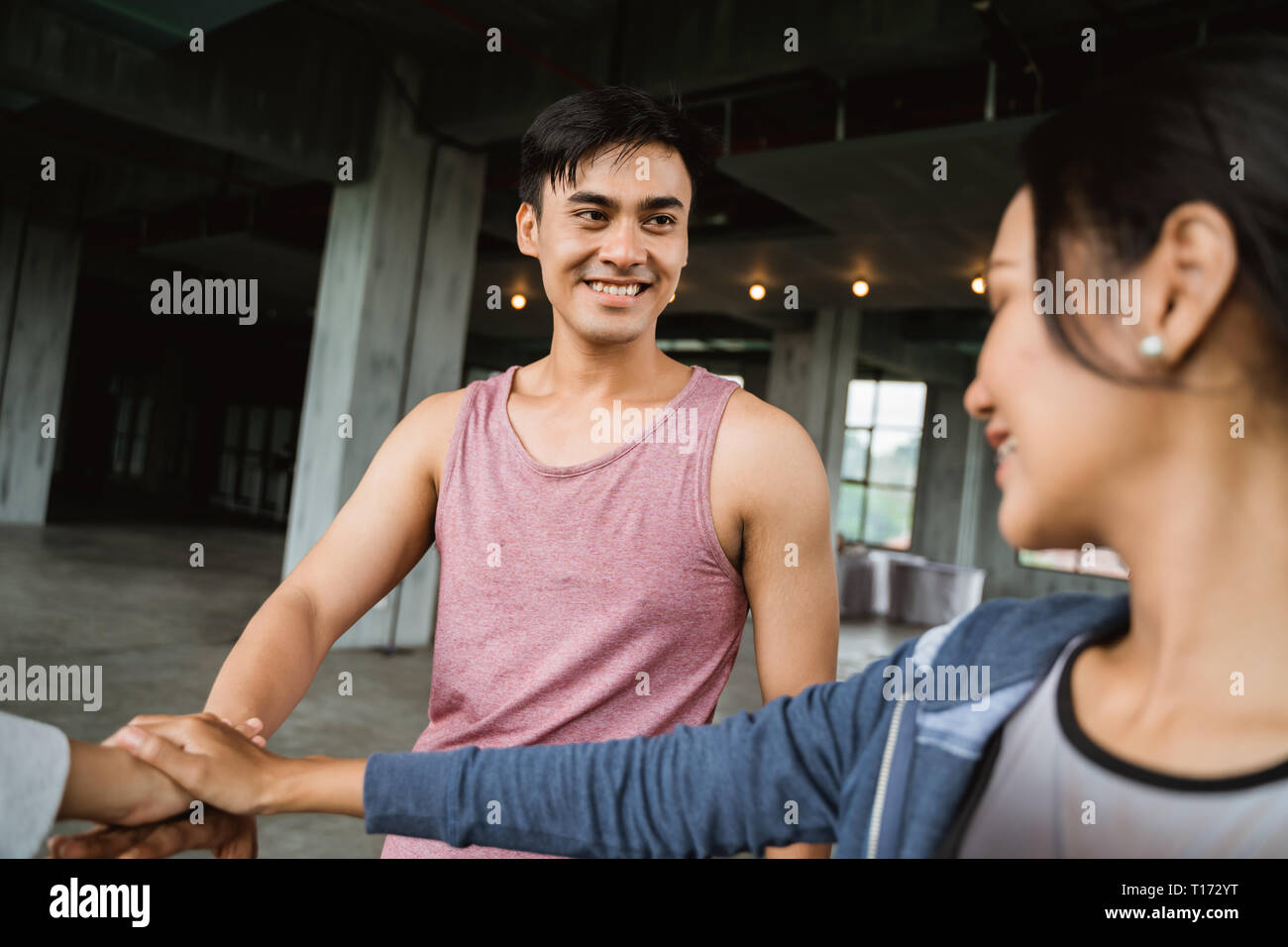 gesture of sport shake hand in the gym Stock Photo - Alamy