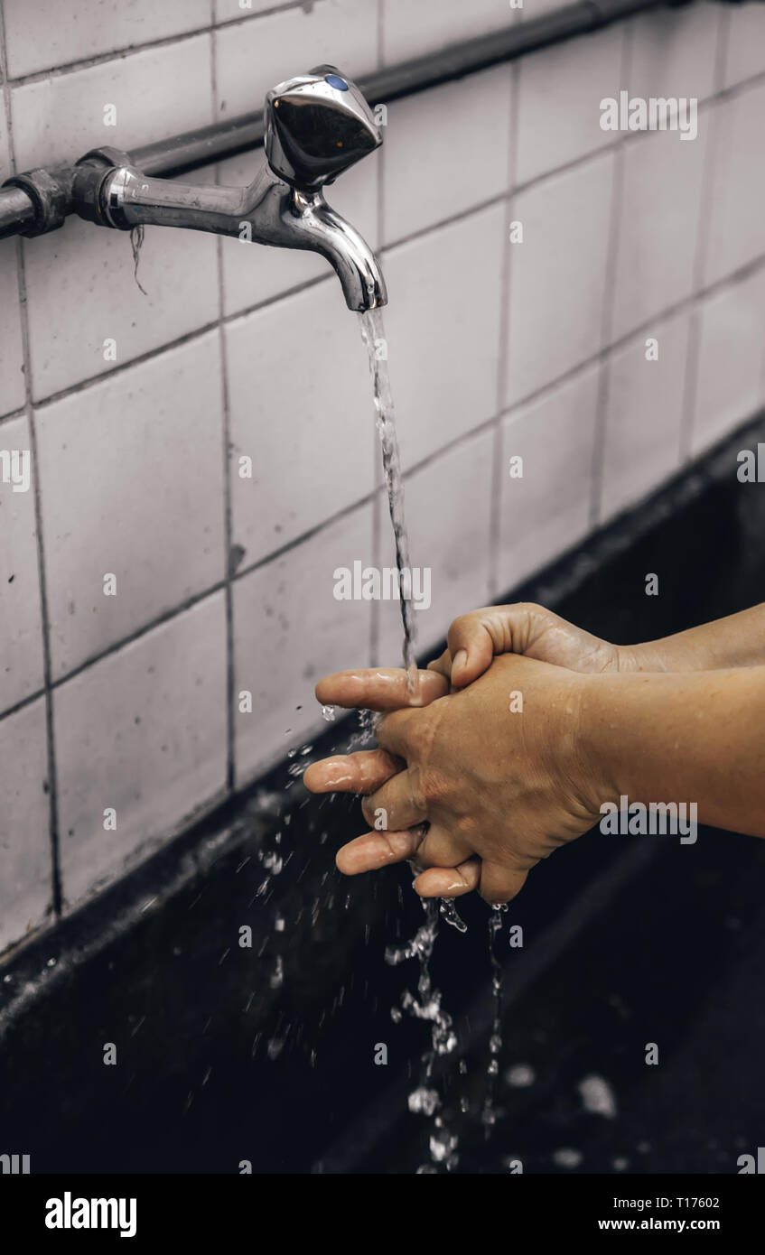 Washing hands with water, cleaning and hygiene detail Stock Photo - Alamy