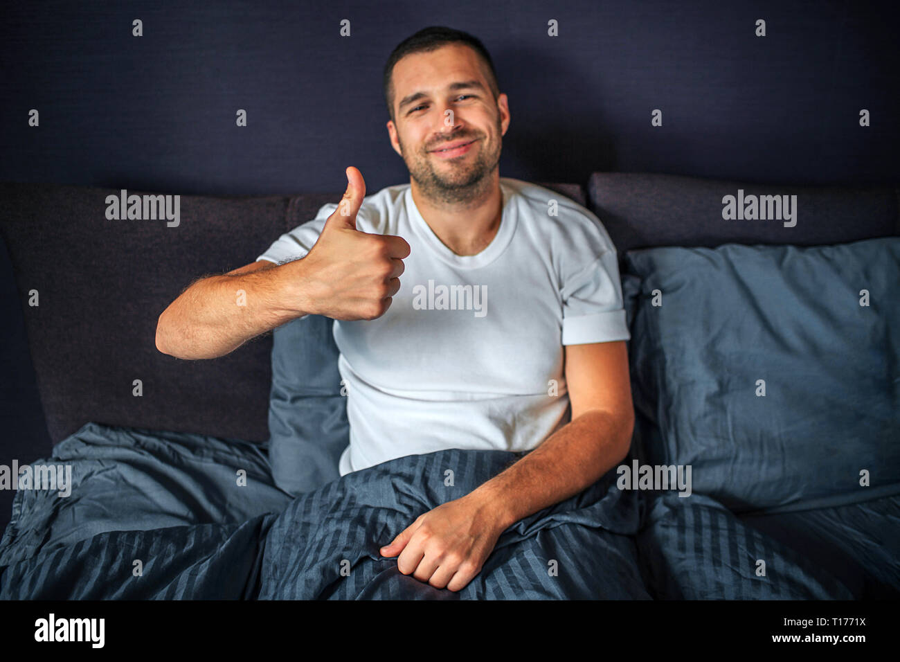 Man Sitting Up In Bed High Resolution Stock Photography and Images - Alamy