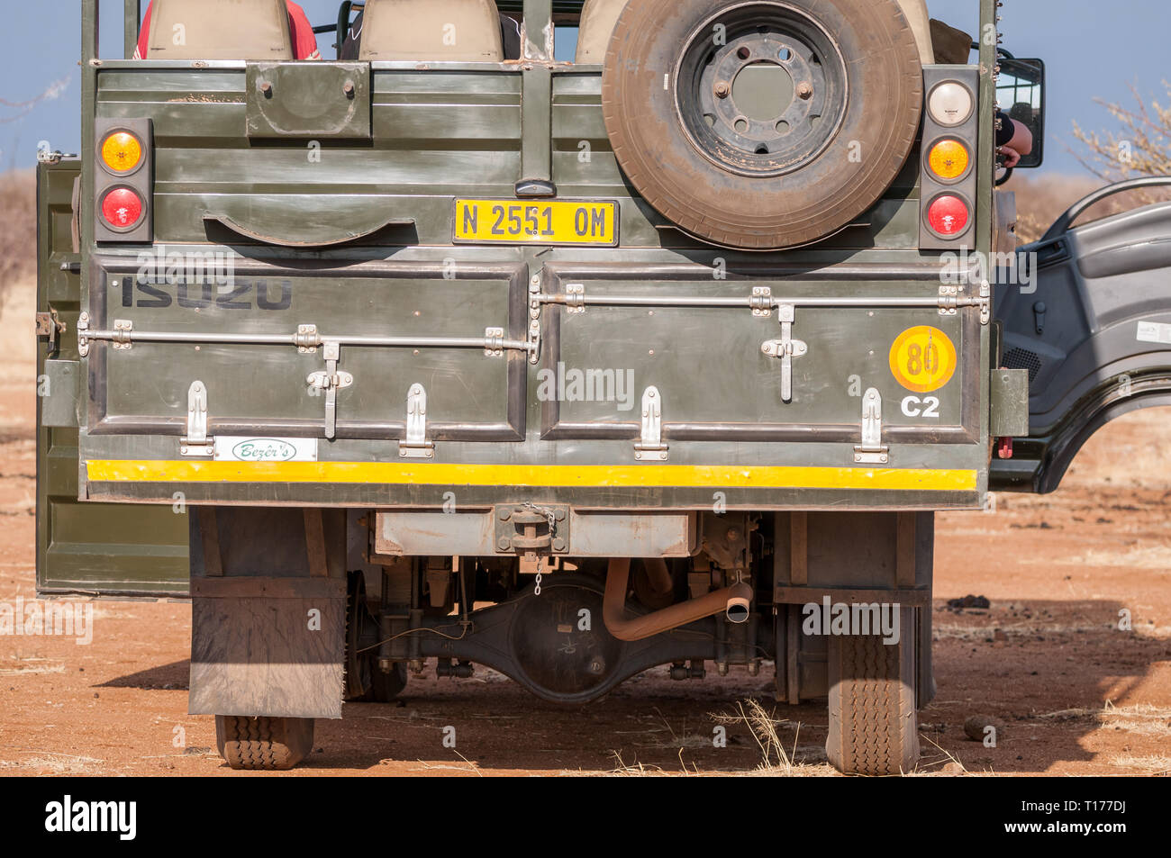back of the car, car license plate, off-road vehicle for tourists ...
