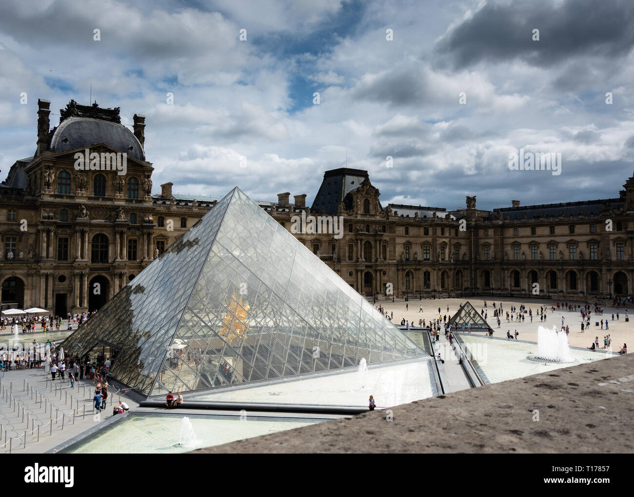 Pyramid of louvre museam glowing under sun, paris, France Stock Photo ...