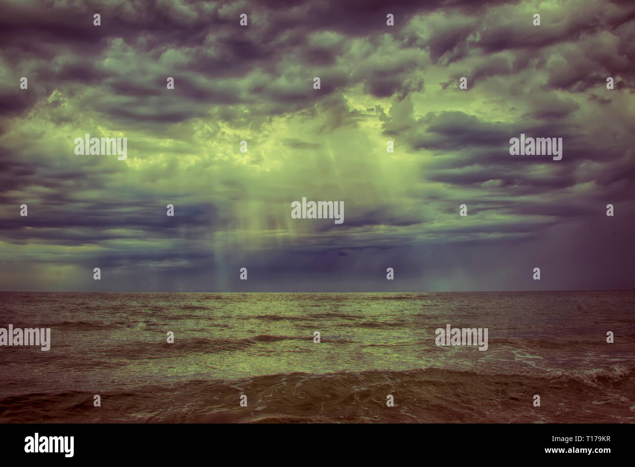 Sea dark landscape with sky clouds waves Stock Photo - Alamy