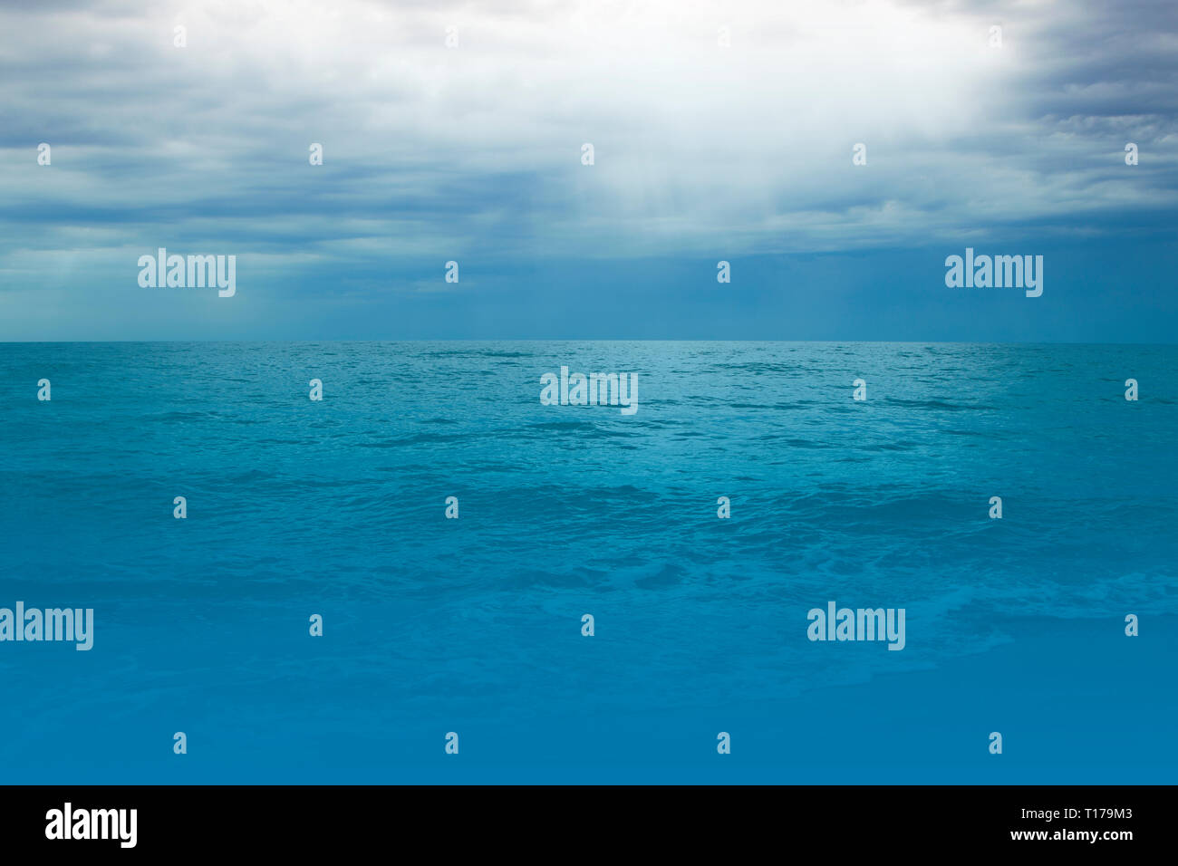 Background image of a bright blue sea Stock Photo - Alamy