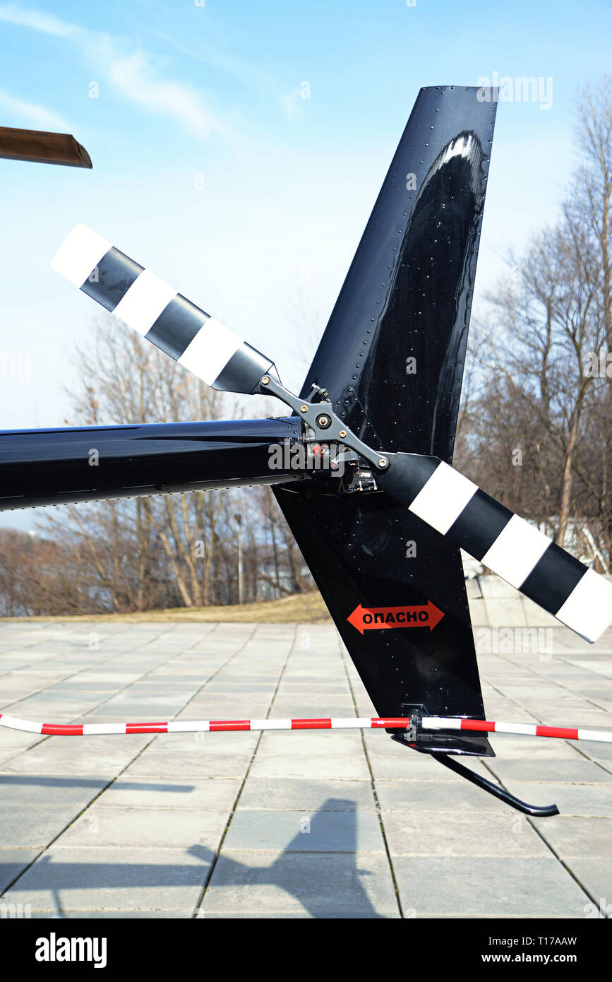 Tail propeller of black helicopter outside Stock Photo - Alamy