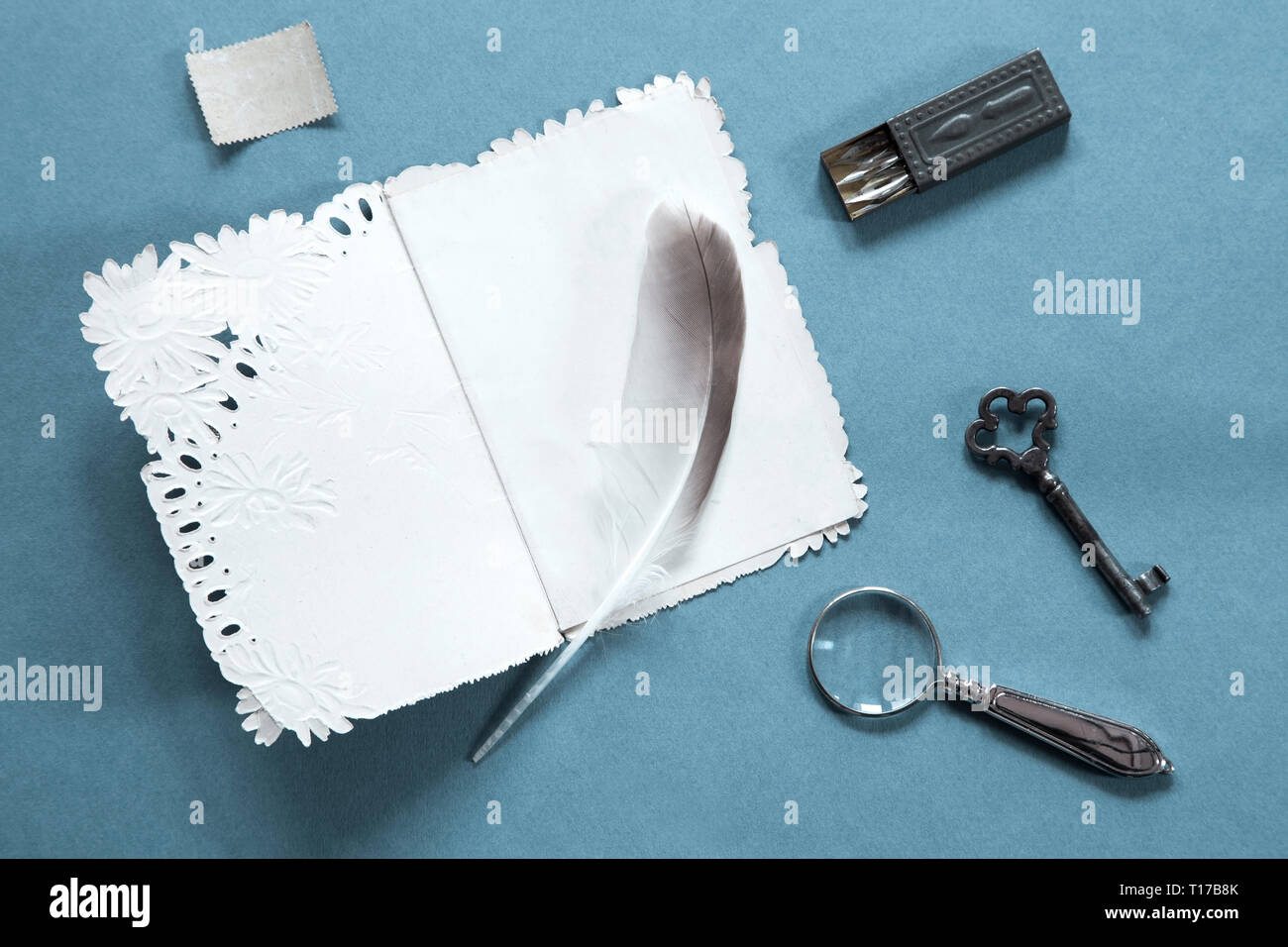 Vintage writing set on a gray cardboard background Stock Photo - Alamy