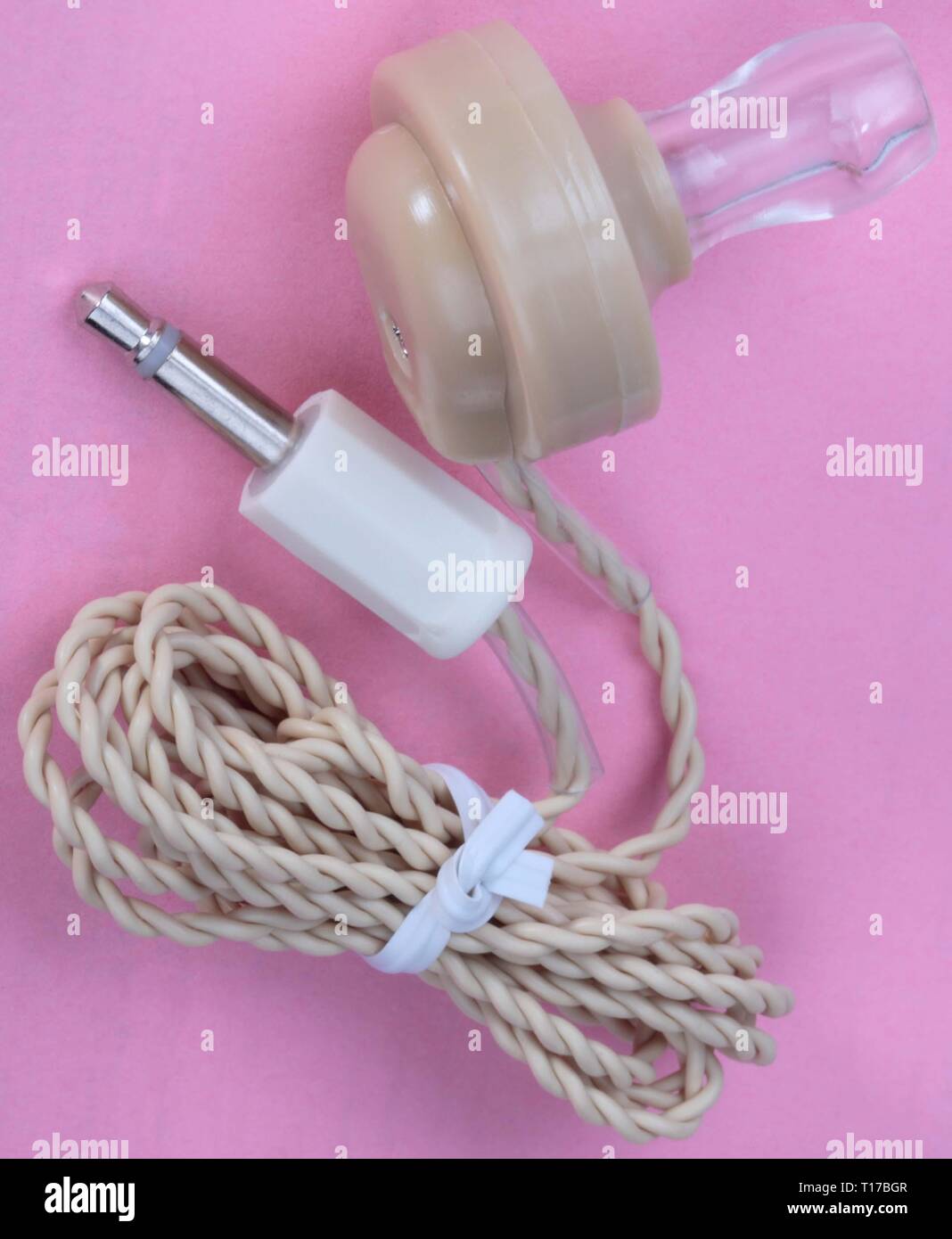 Plastic Headphones on Pink Background Stock Photo - Alamy