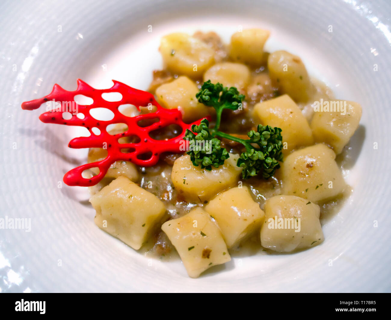gnocchi pasta with herbs dish close up Stock Photo - Alamy