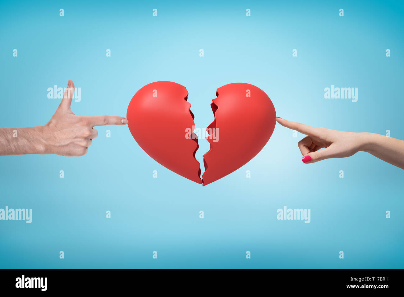 Hands holding broken heart hi-res stock photography and images - Alamy