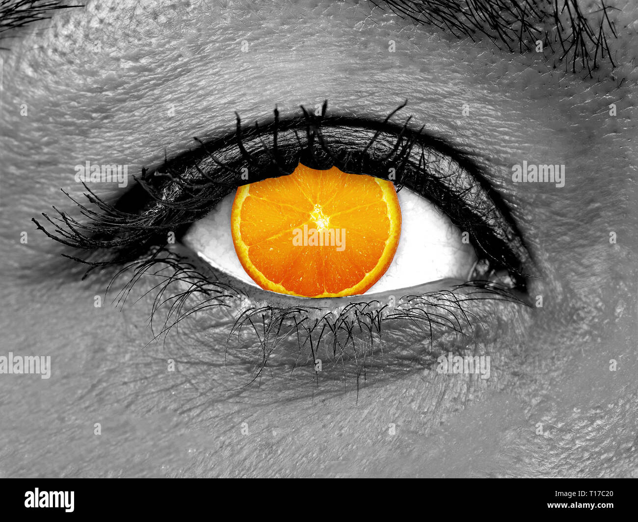 Woman eye closeup orange slice as pupil Stock Photo - Alamy