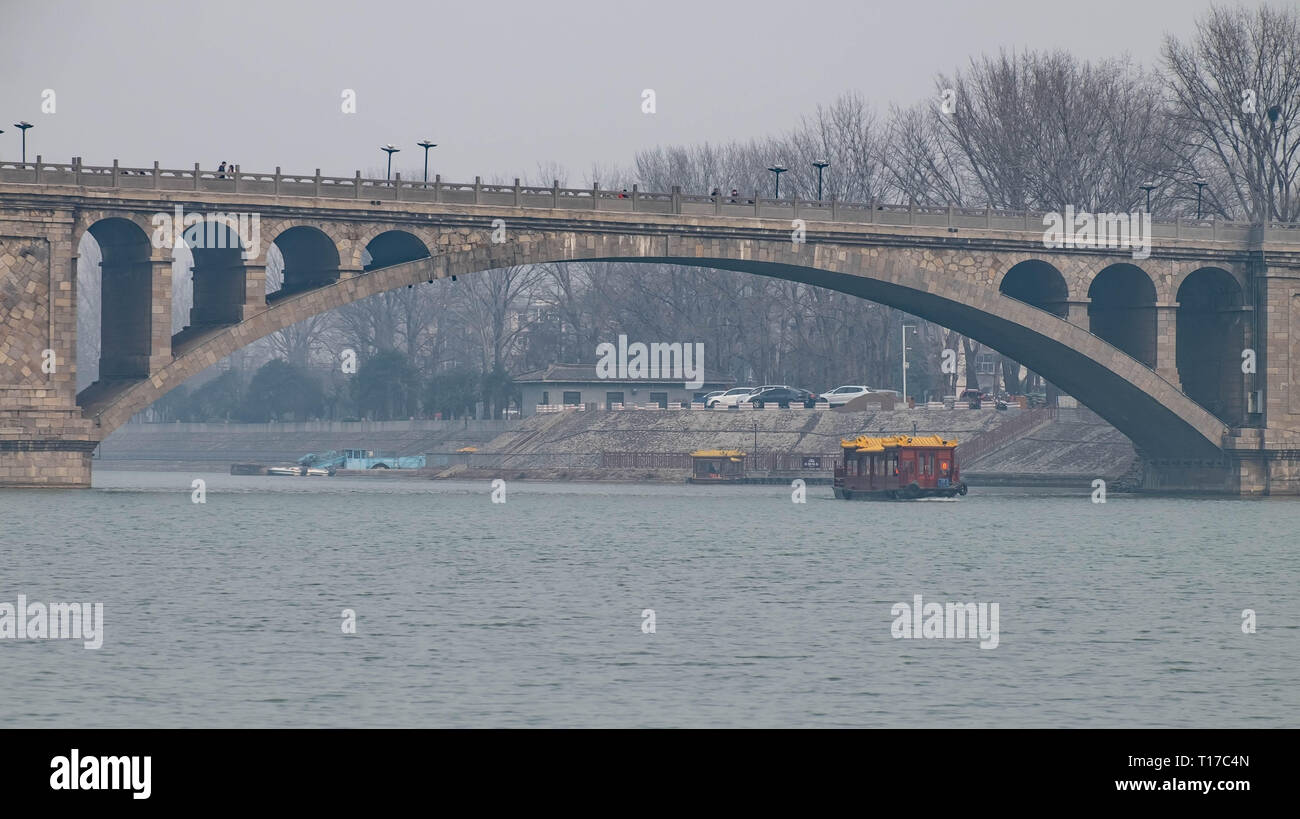The walk way along the river and the bridge with the Chinese style at ...
