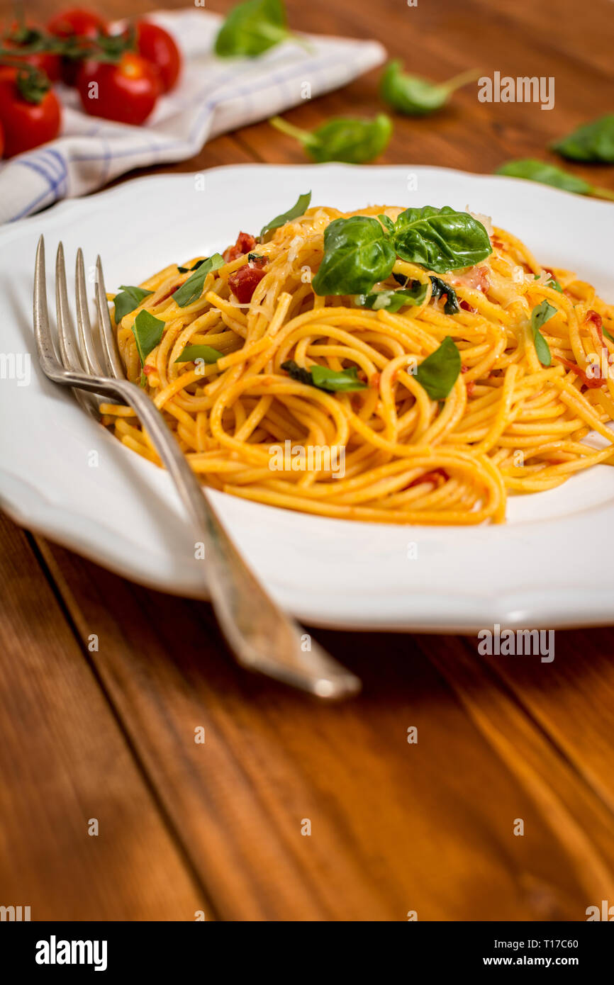 Traditional italian cuisine spaghetti with tomato sauce, basil and ...
