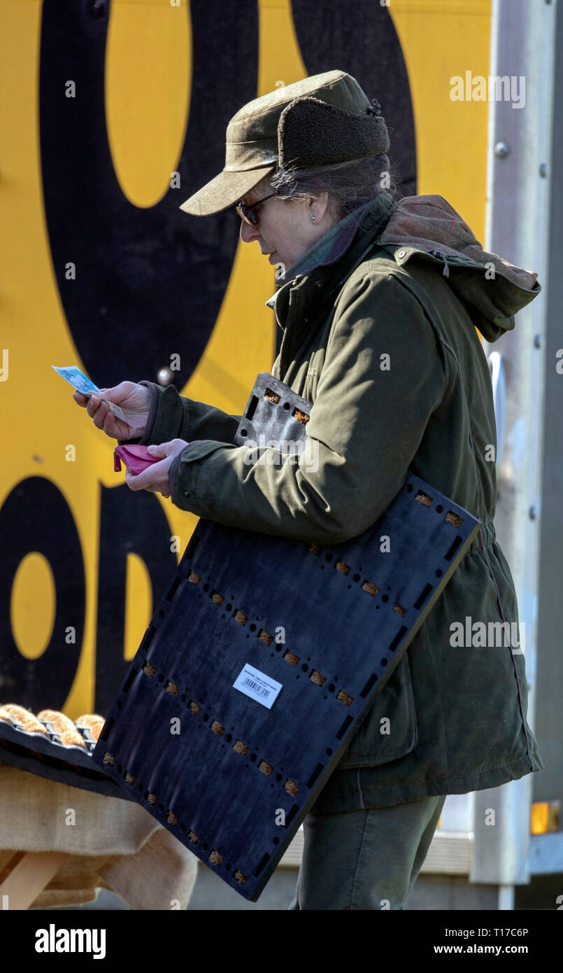 Princess Anne buys a doormat at the Land Rover Gatcombe Horse Trials ...