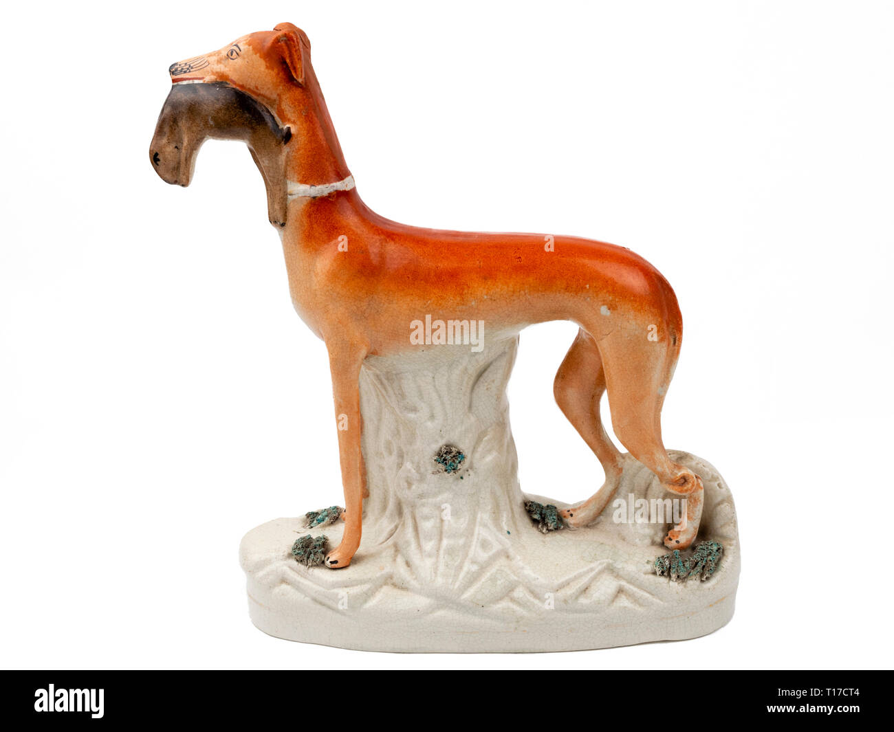 Staffordshire pottery standing greyhound with hare in it's mouth. This ...