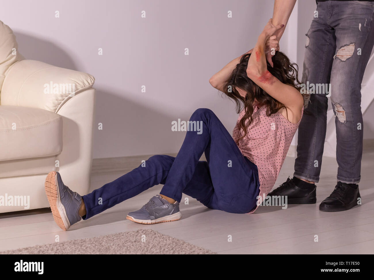Man dragging woman by hair hi-res stock photography and images - Alamy