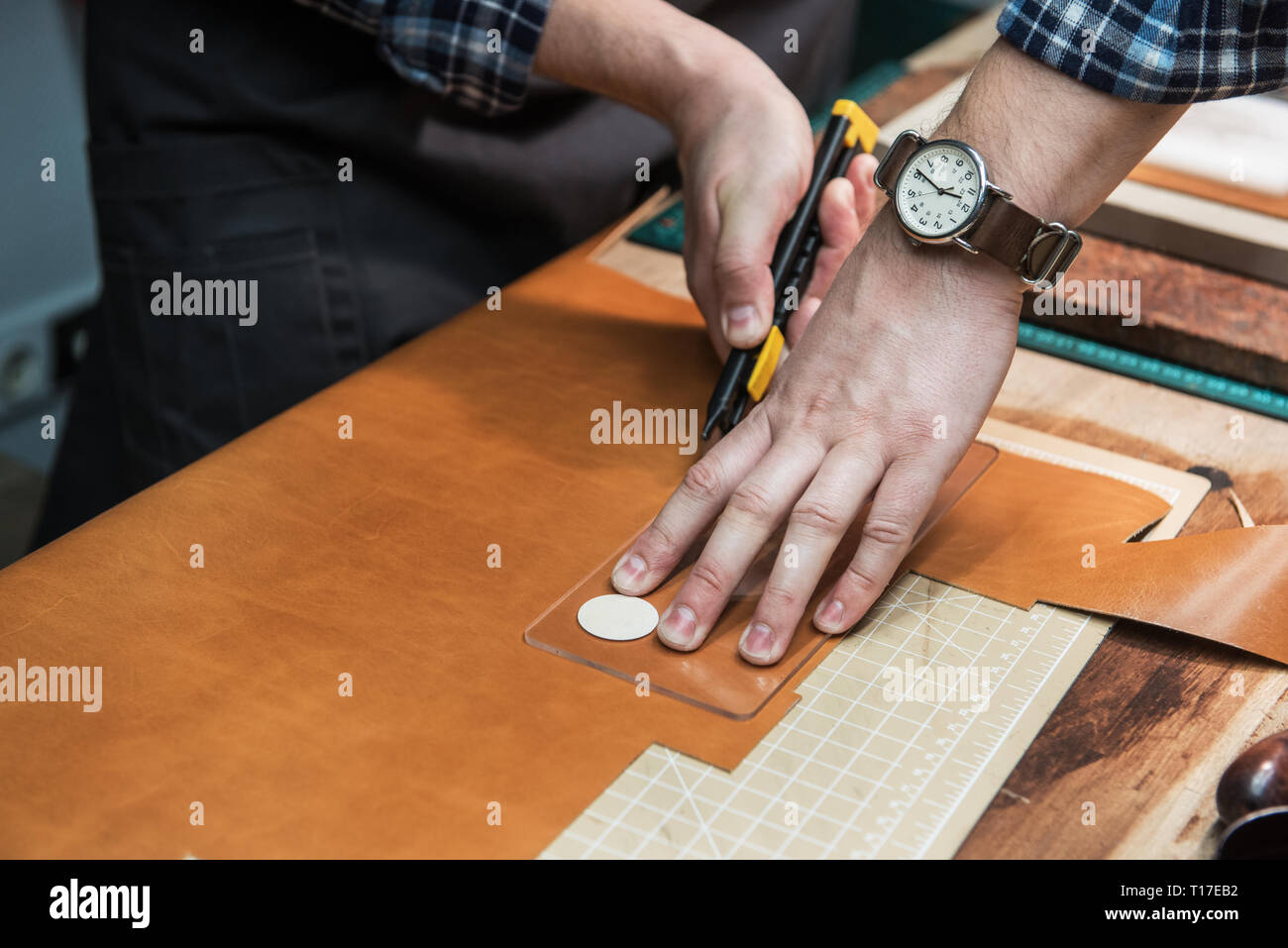 Leather goods master craftsman work hi-res stock photography and images ...