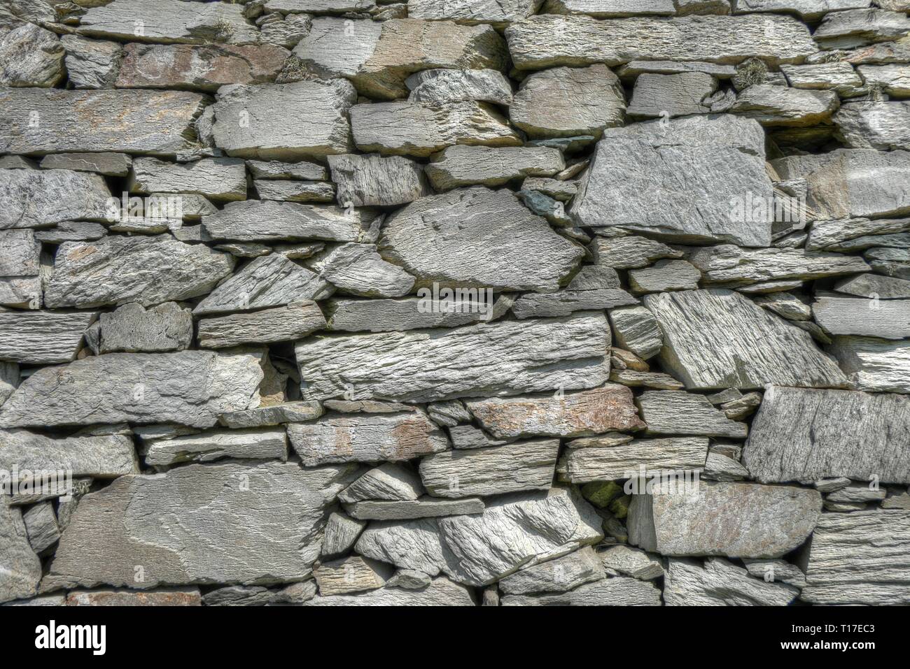 Traditional dry stone wall near Rhoscolyn, Anglesey, Wales, UK Stock ...