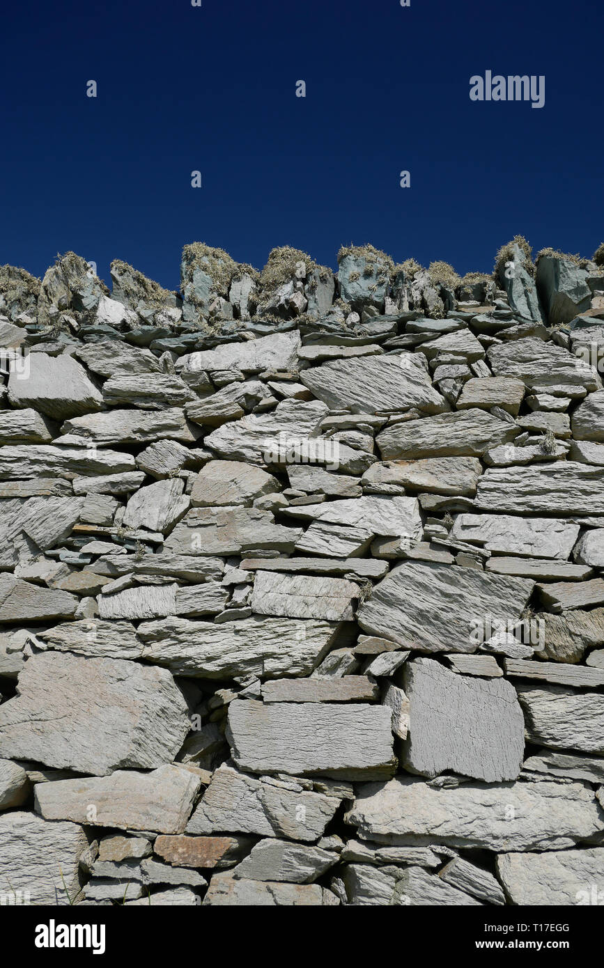 Traditional dry stone wall with blue sky near Rhoscolyn, Anglesey ...