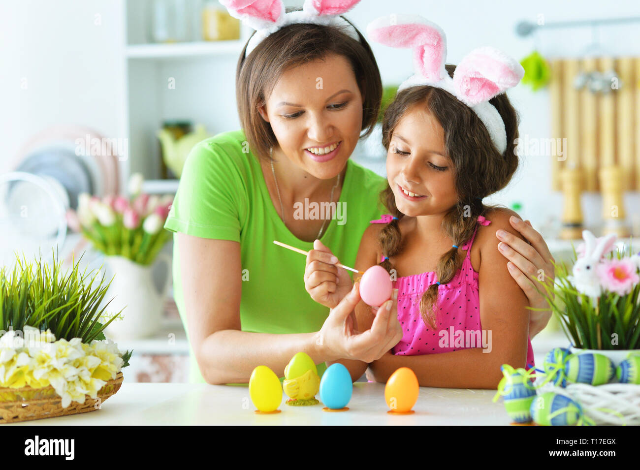 Portrait of mother and daughter with Easter eggs Stock Photo - Alamy