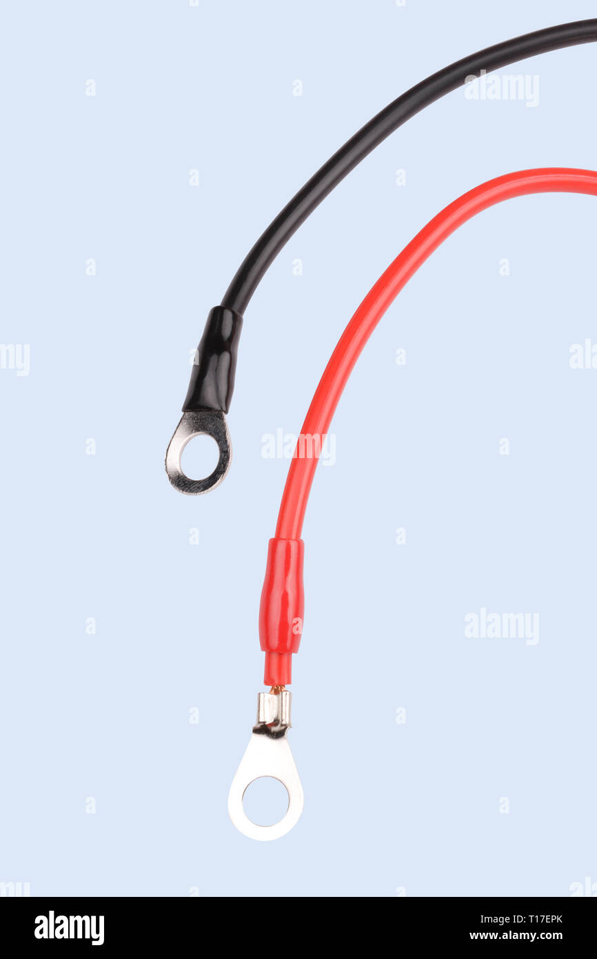 Two Wire Red and Black Isolated on Blue Stock Photo - Alamy