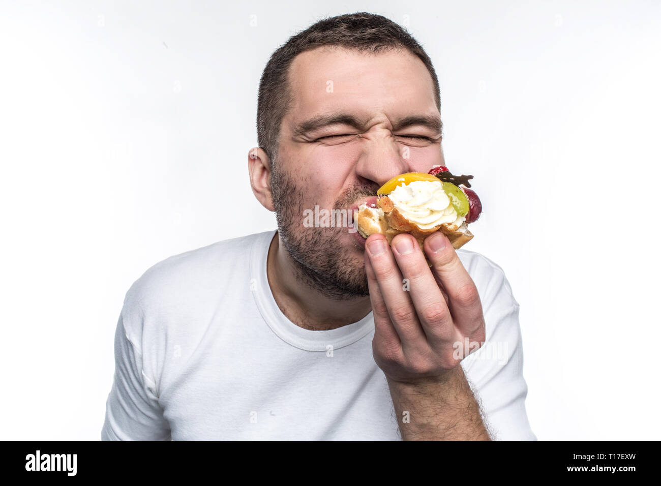 Closer shot of strang and weird man that likes to eat lots af unhealthy ...