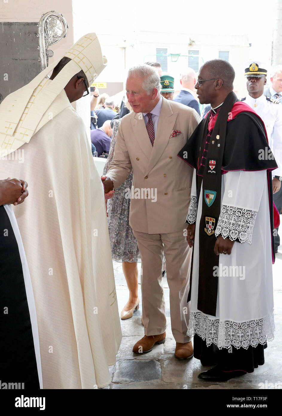 The Prince of Wales and the Duchess of Cornwall are greeted by the ...