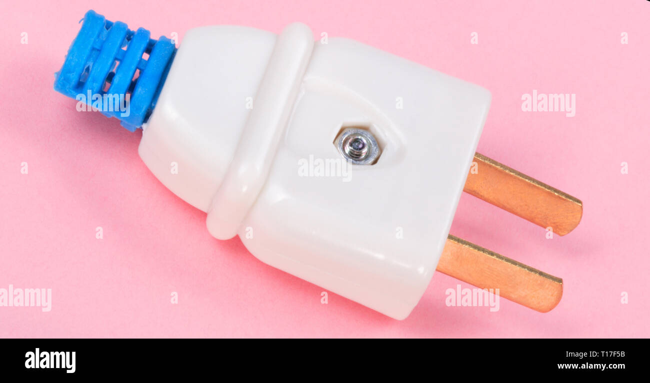 American Outlet Plug on pink background Stock Photo - Alamy